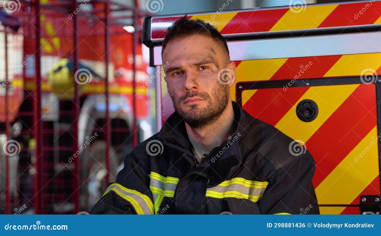 Tired Fireman in Protective Uniform Looking at Camera while Sitting ...