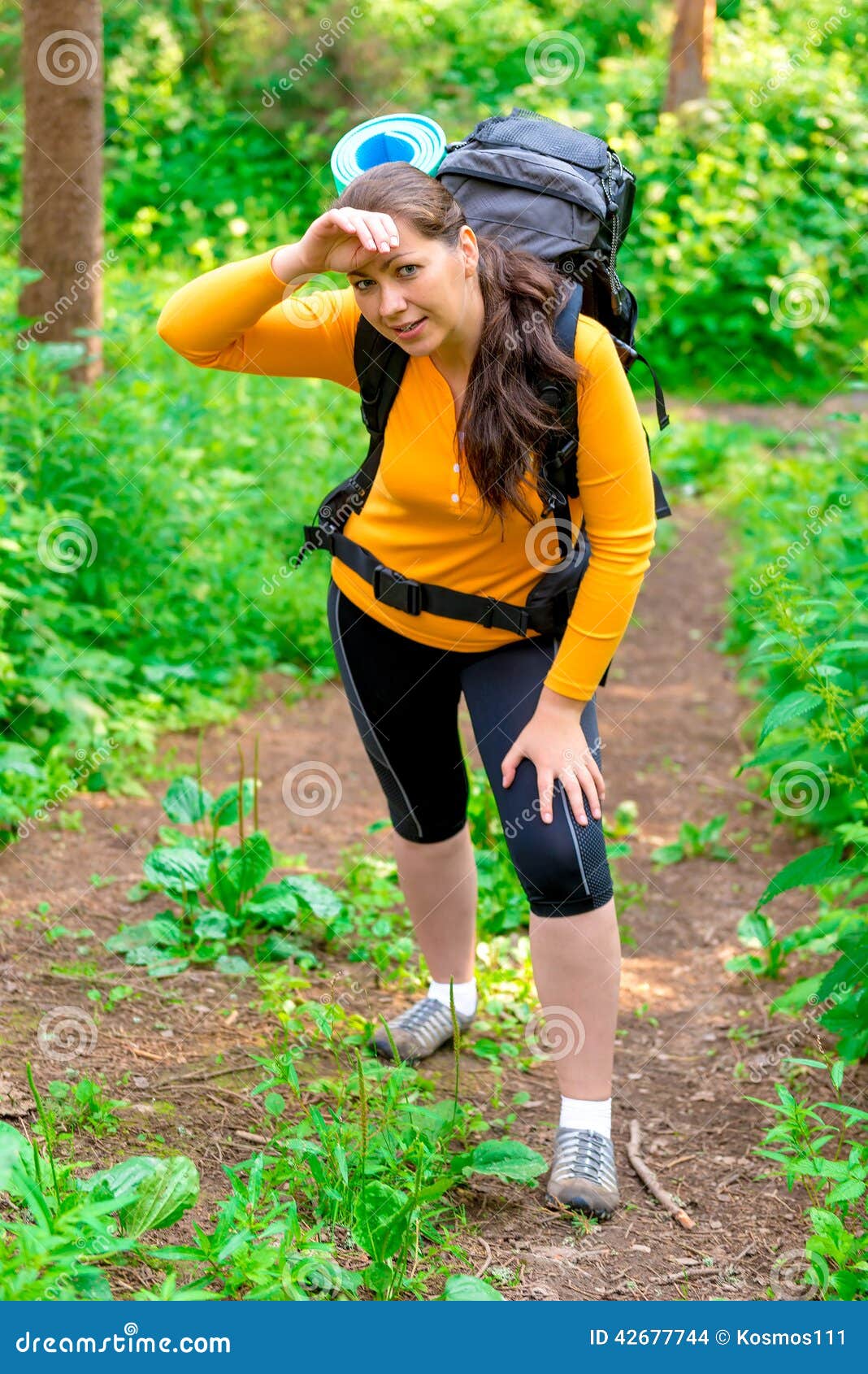 Tired girl with a backpack stock photo. Image of nature - 42677744