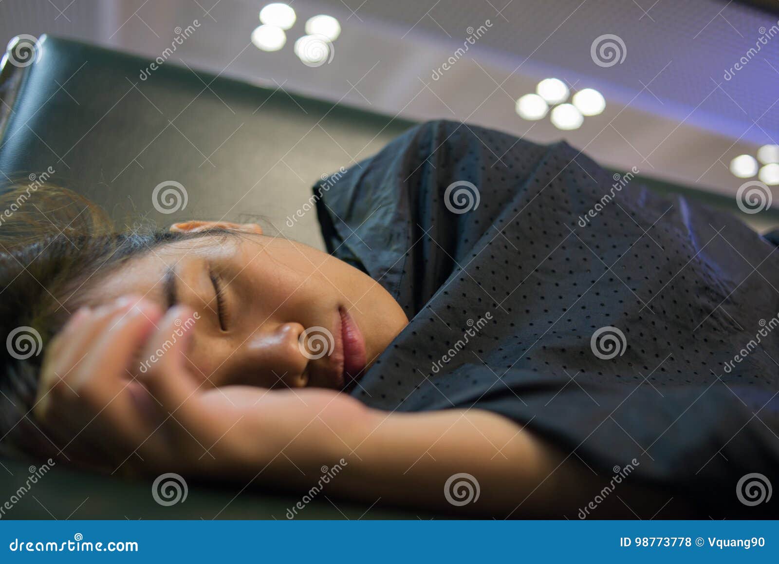 Tired Girl Sleeping in the Airport because Flight Delay Stock Photo ...
