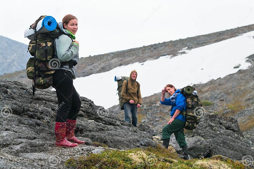 Tired Group of Backpackers in Mountains Stock Image - Image of adult ...