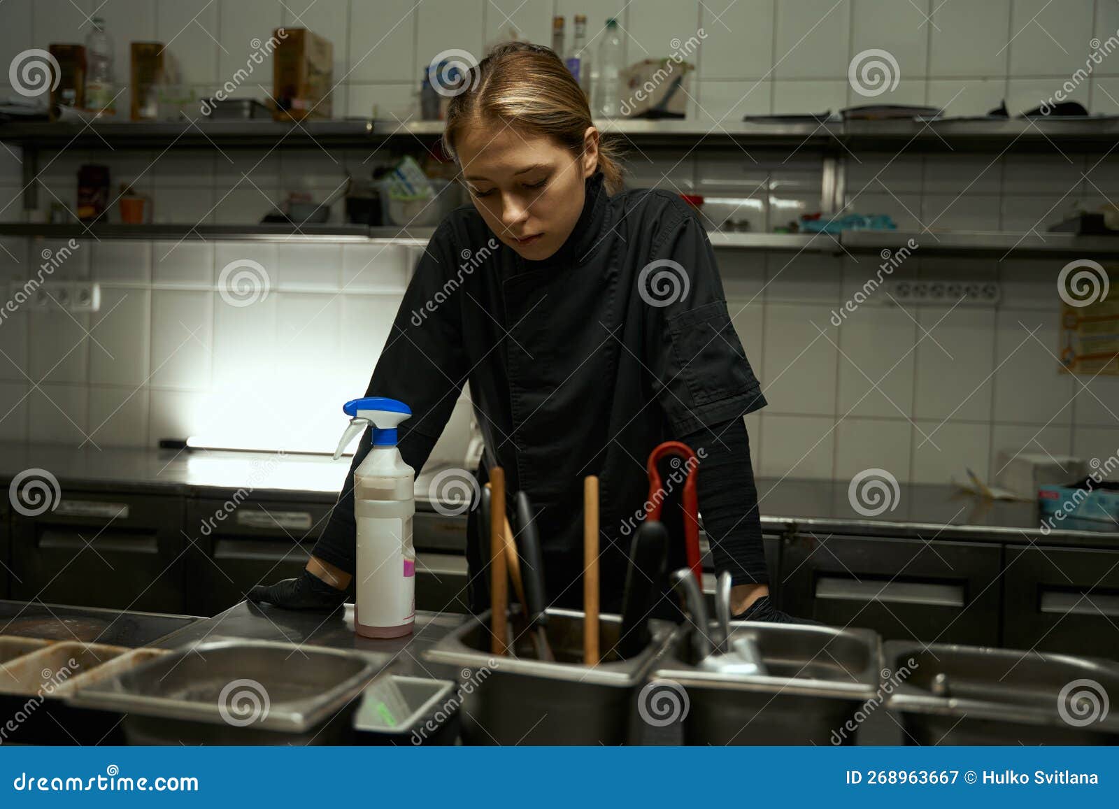 Tired Kitchen Worker is Standing in a Restaurant Kitchen Stock Image ...