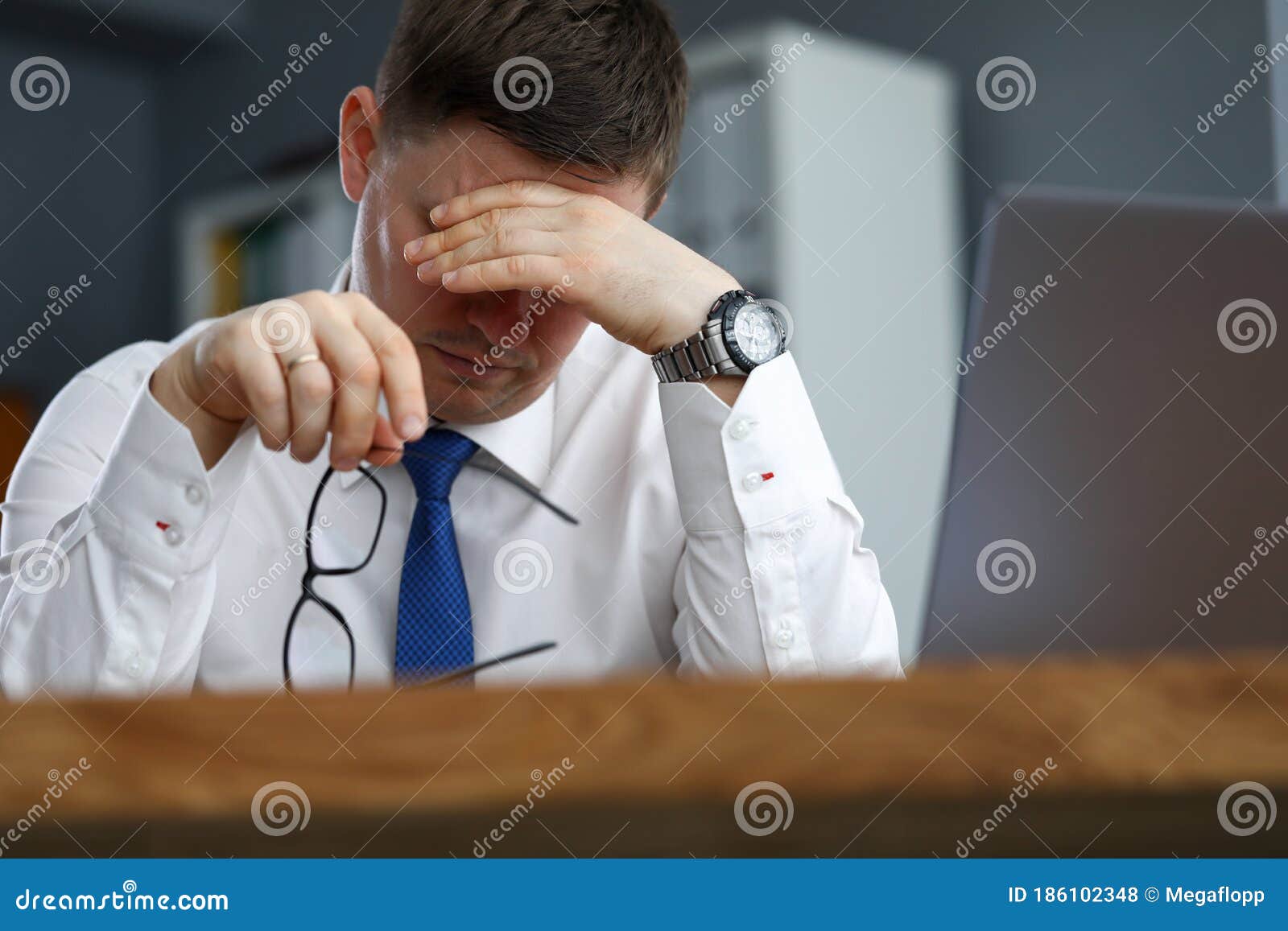 Tired Male Office Worker Sitting at Table Resting Stock Photo - Image ...