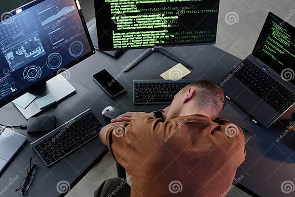 Tired Male Programmer Lying on Working Desk with Computers Resting in ...