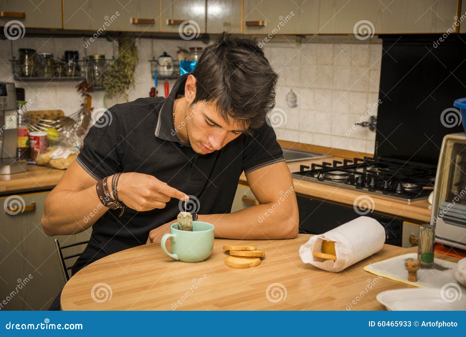 Tired Man with Coffee Sitting at Kitchen Table Stock Image - Image of ...