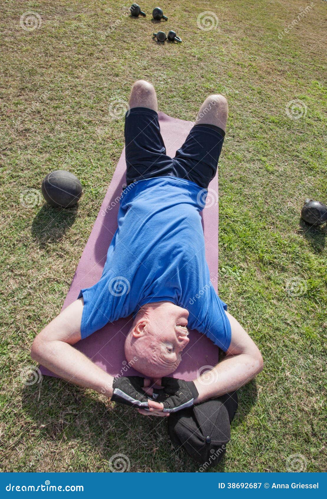 Tired Man Exercising stock image. Image of grass, people - 38692687