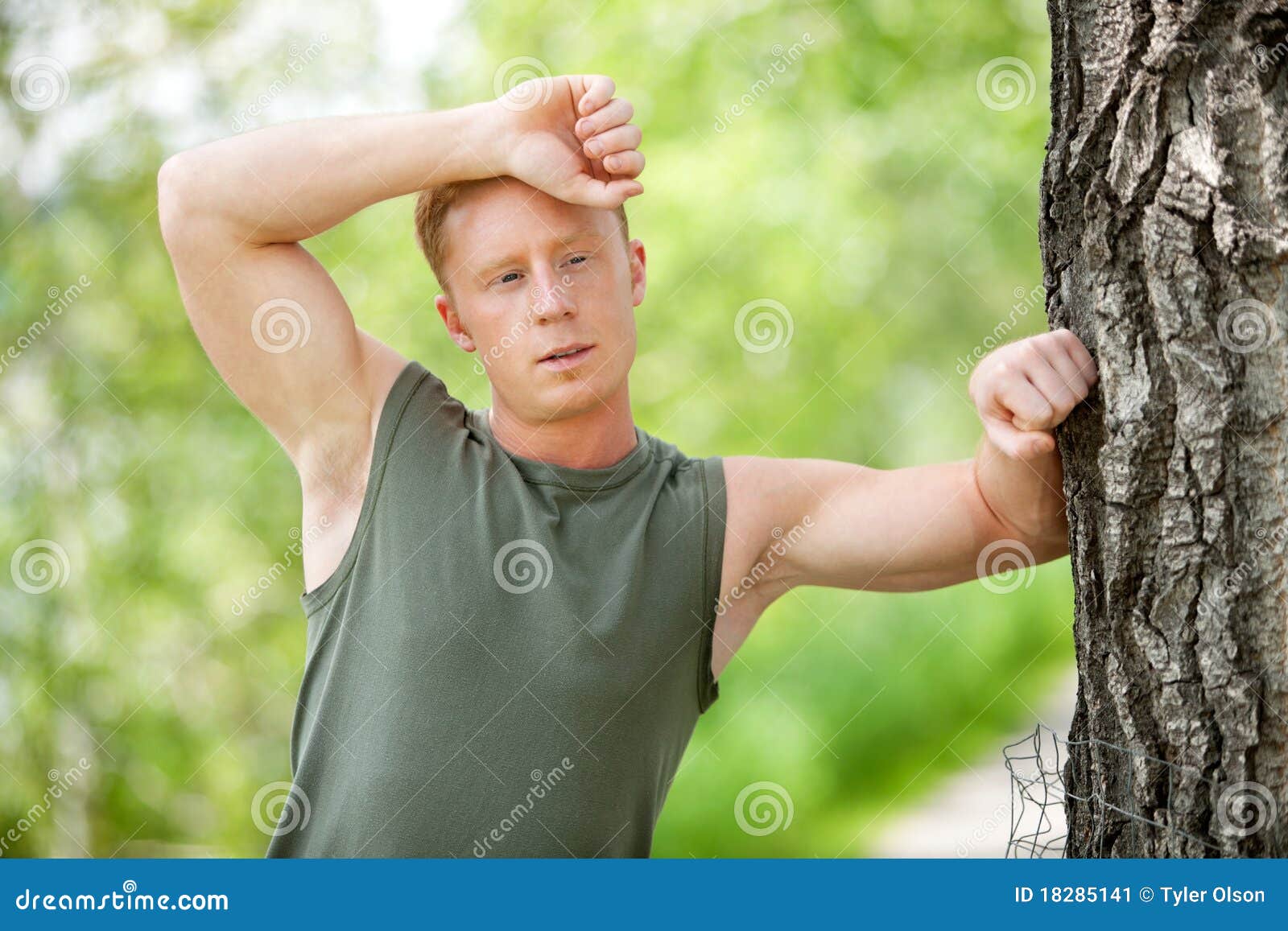 Tired man leaning on tree stock image. Image of caucasian - 18285141