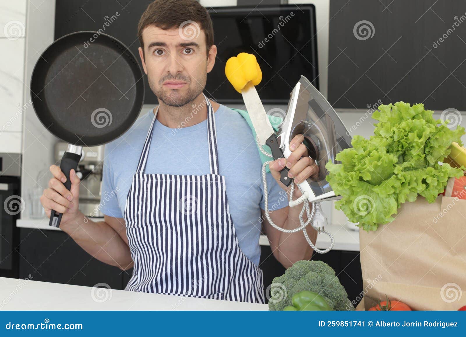 Tired Man Multitasking at Home Stock Image - Image of apron, housework ...