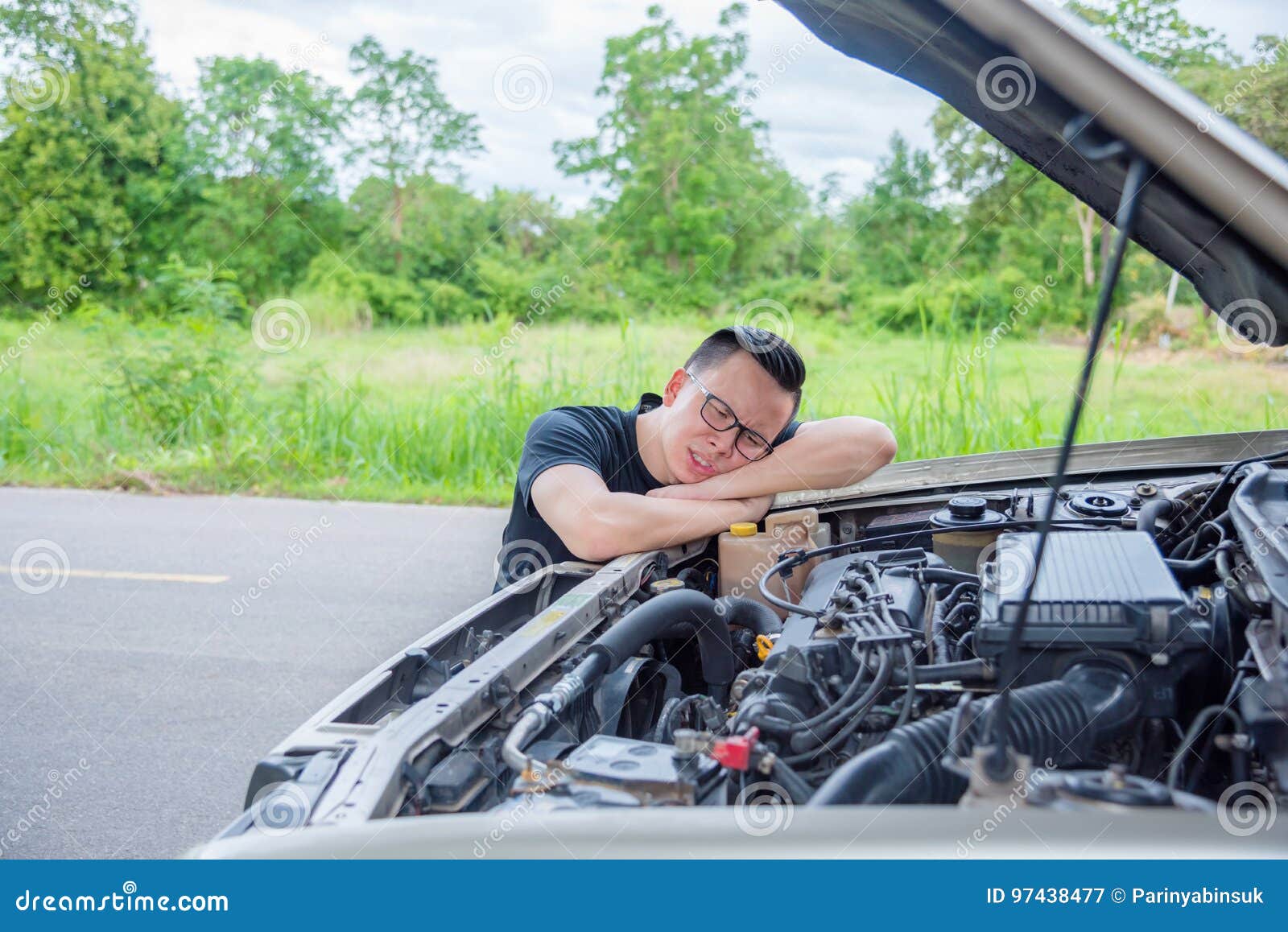 Tired Man Sitting beside a Broken Waiting for Assistance Stock Image ...