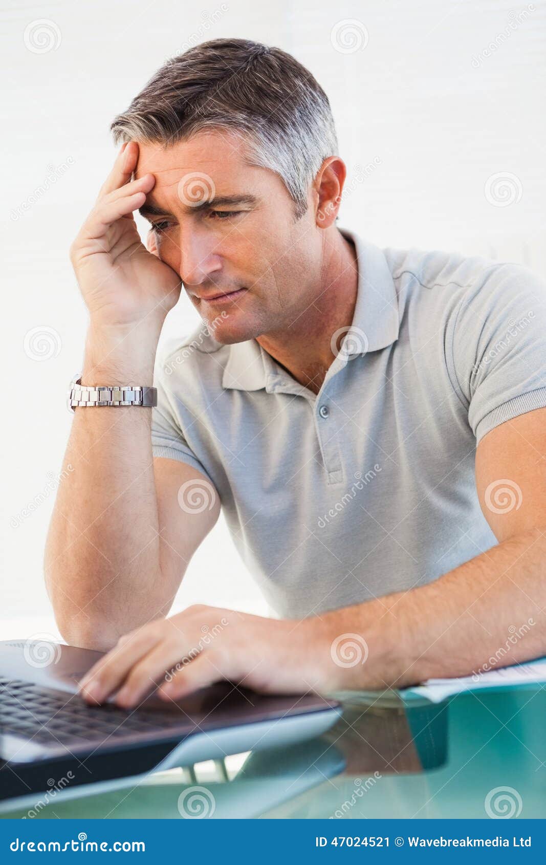 Tired Man Sitting and Using His Laptop Stock Image - Image of tired ...