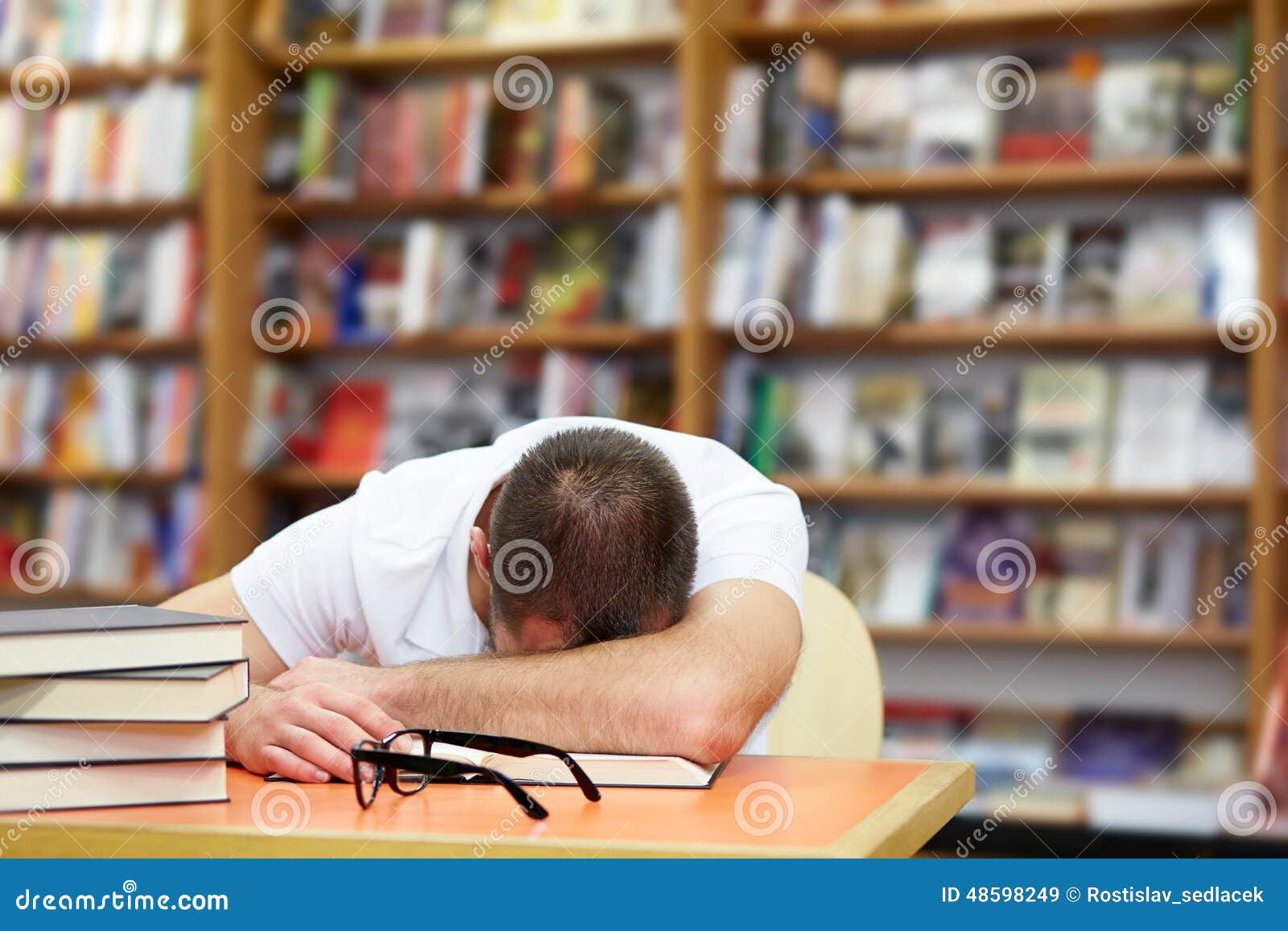 Tired Man Sleeping in the Library Stock Image - Image of person ...