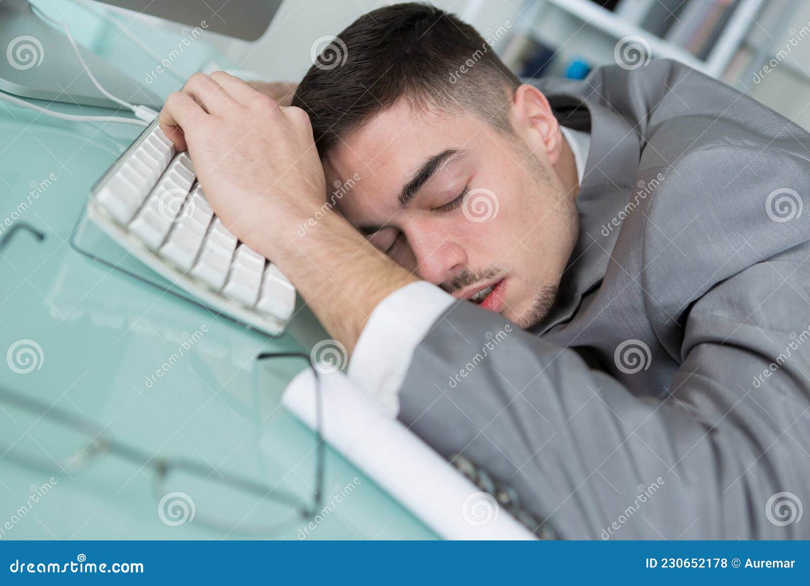Tired man sleeping on work stock photo. Image of closeup - 230652178