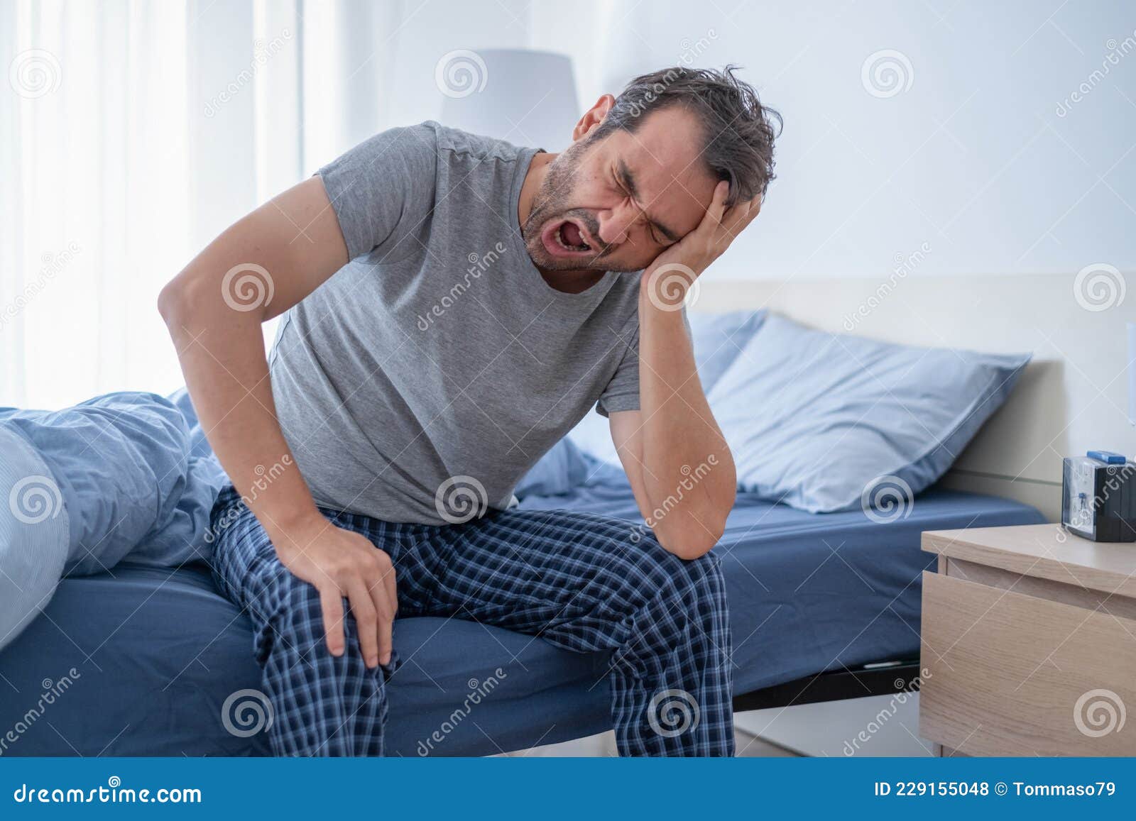 Man Wakes Up from Bed after a Bad Sleep Night Stock Photo - Image of ... Man Wakes Up from Bed after a Bad Sleep Night Stock Photo - Image of ...