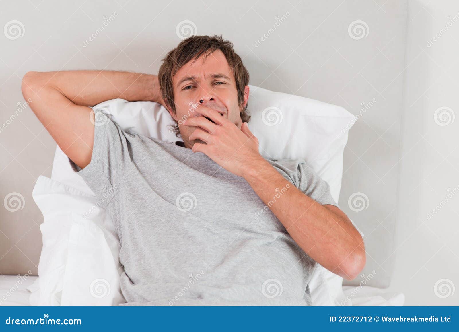 Tired man yawning stock photo. Image of background, bedroom - 22372712