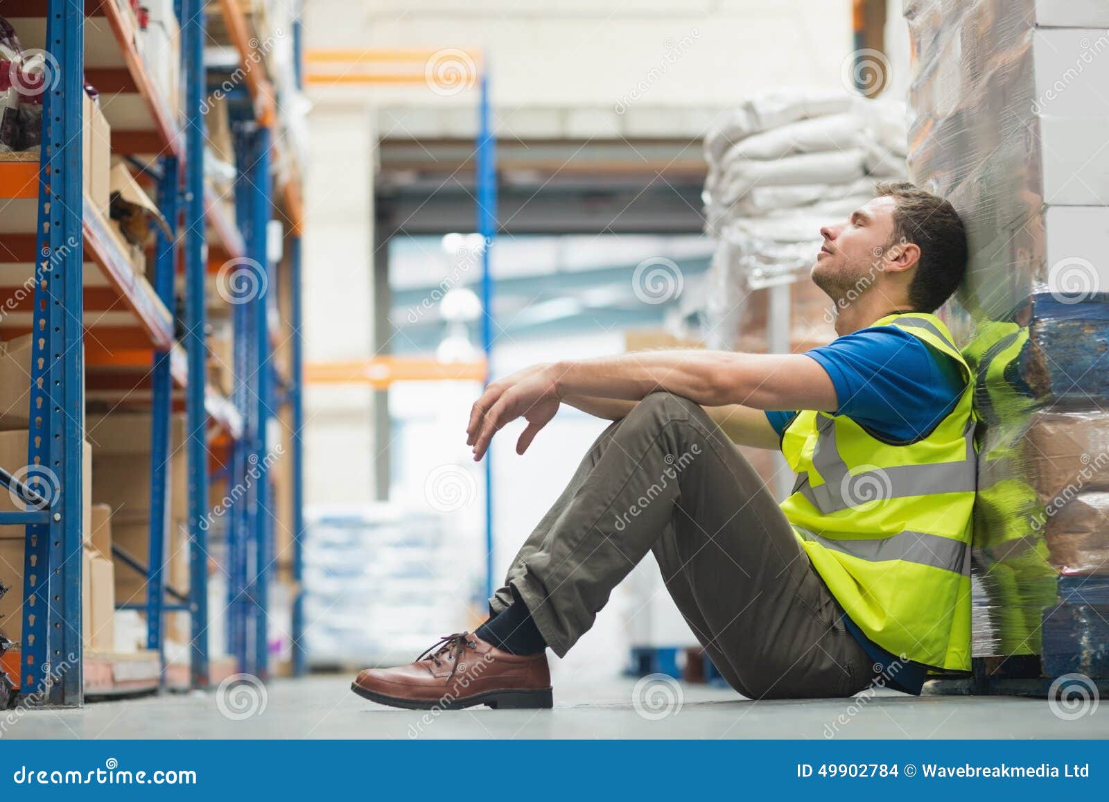 Tired Manual Worker Sitting on Floor Stock Photo - Image of cardboard ...