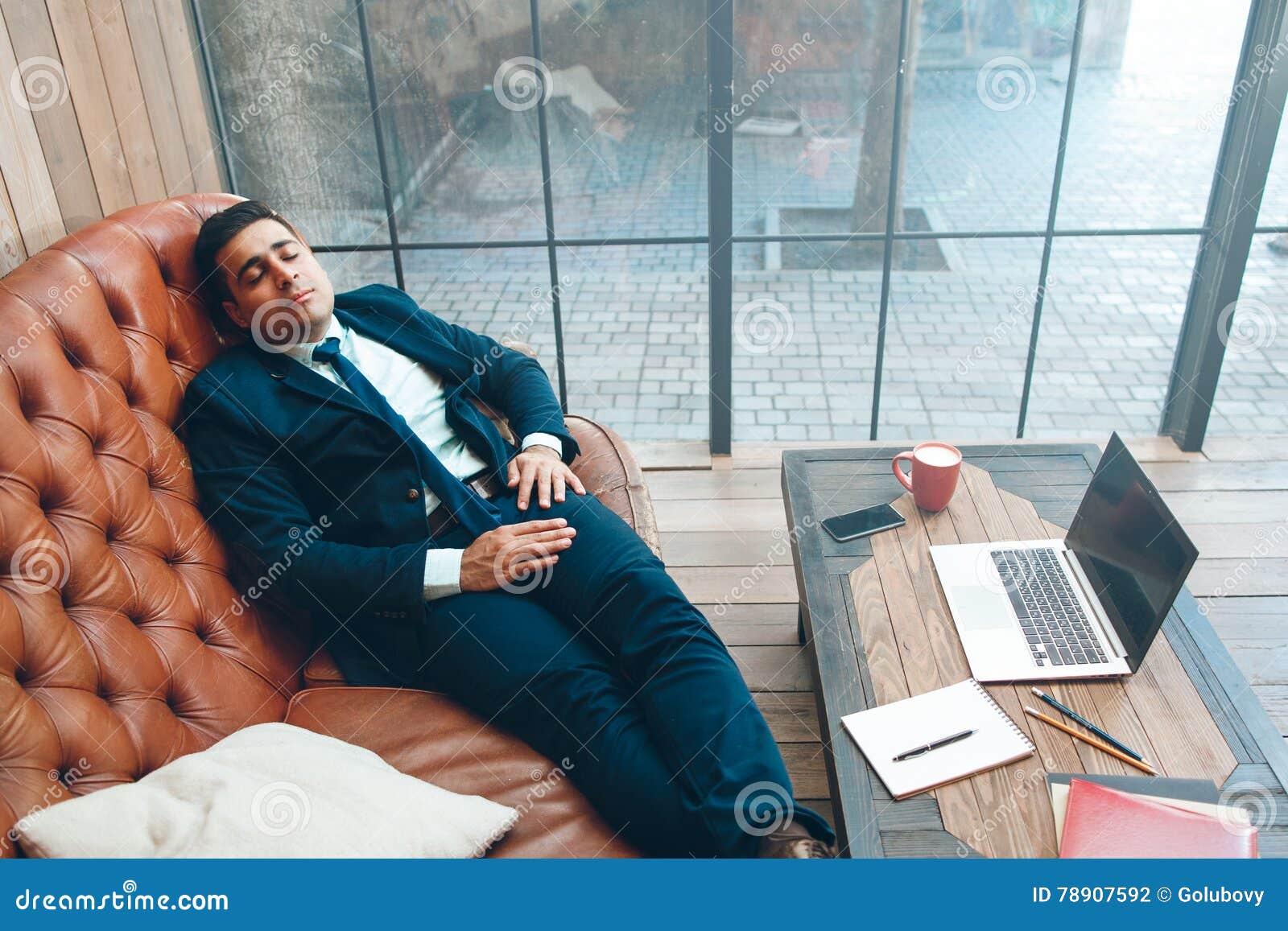 Tired Office Worker Lying on Leather Sofa Stock Photo - Image of lying ...