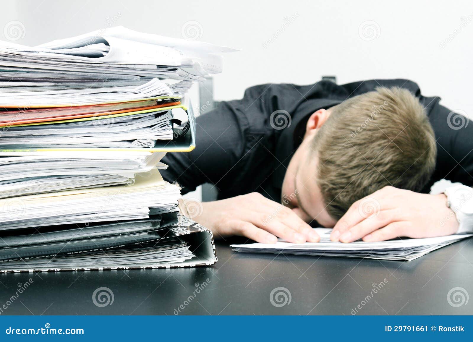 Tired Office Worker And A Pile Of Documents Royalty-Free Stock ...