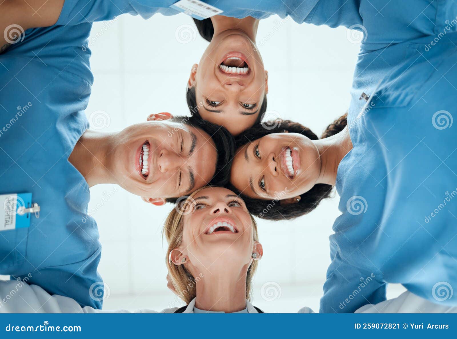 Tired is Our Motto. a Group of Medical Practitioners Having a Private Huddle at Work. Stock ...