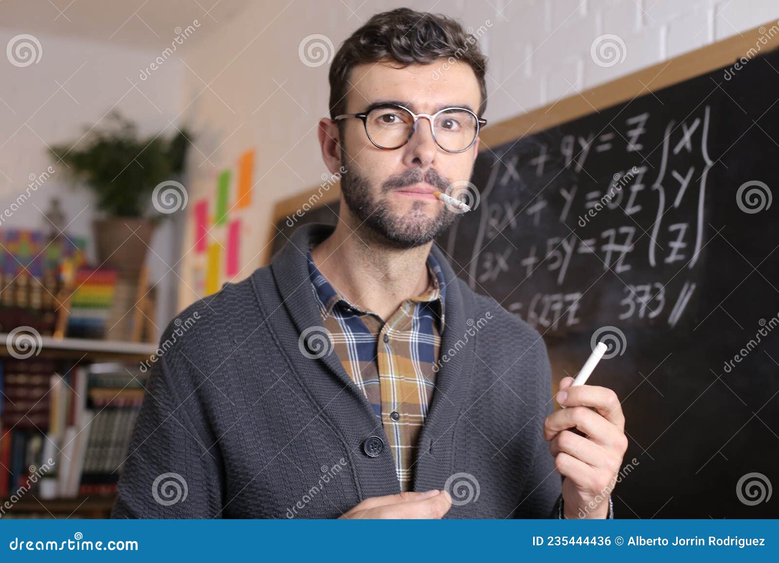 Tired and Overworked Teacher Smoking in Classroom Stock Photo - Image ...