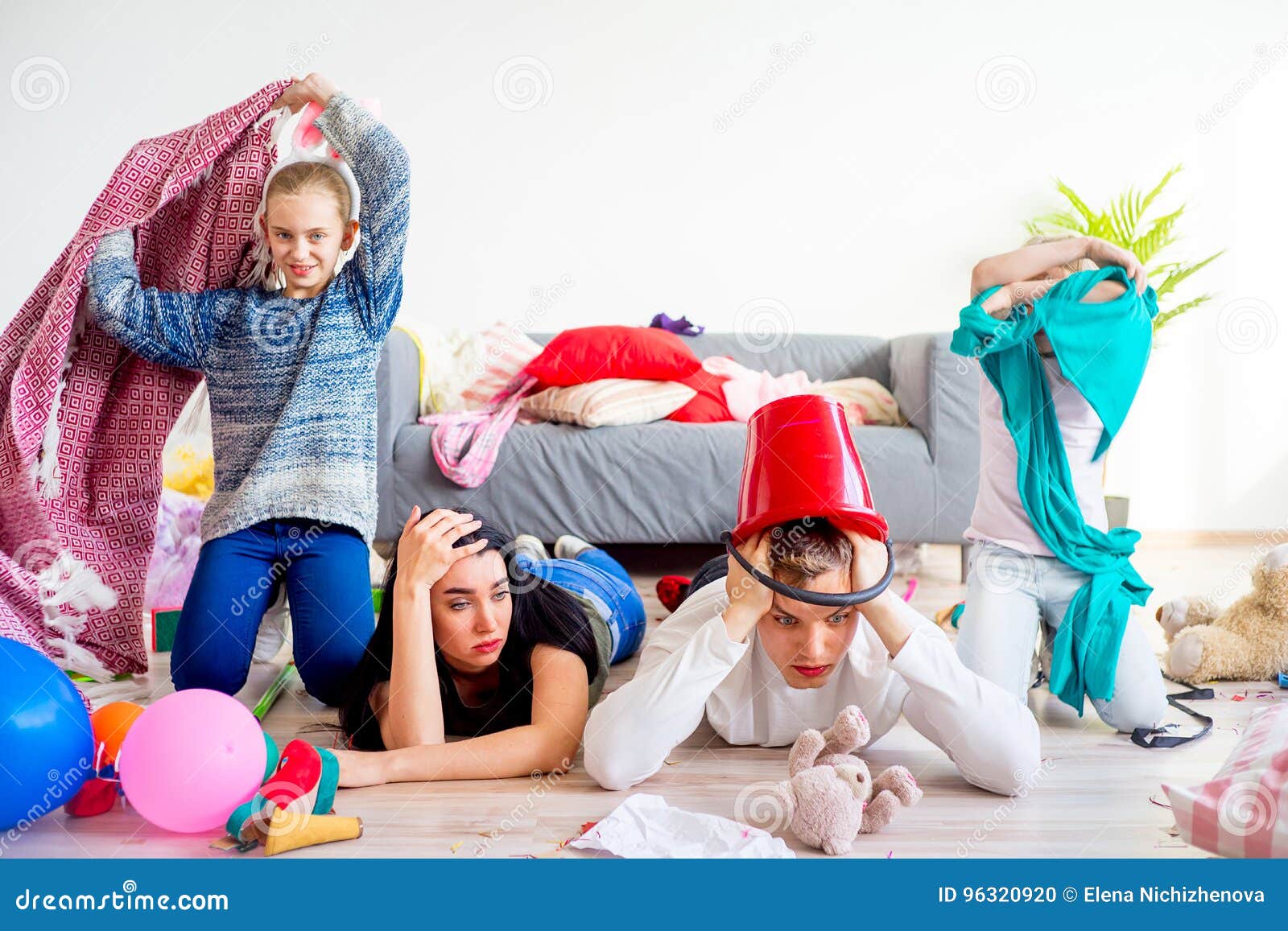 Tired Parents and Romping Kids Stock Photo - Image of home, housekeeper ...