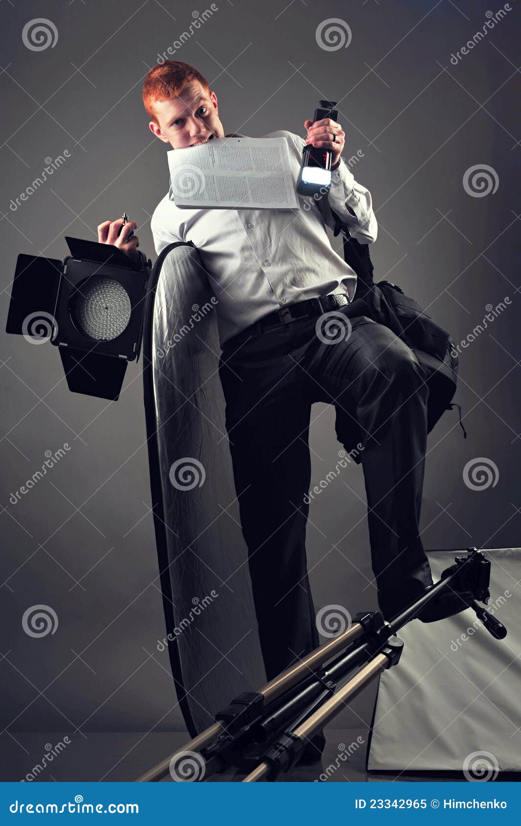 A Tired Photographer Assistant Stock Image - Image of cheerful, indoors ...