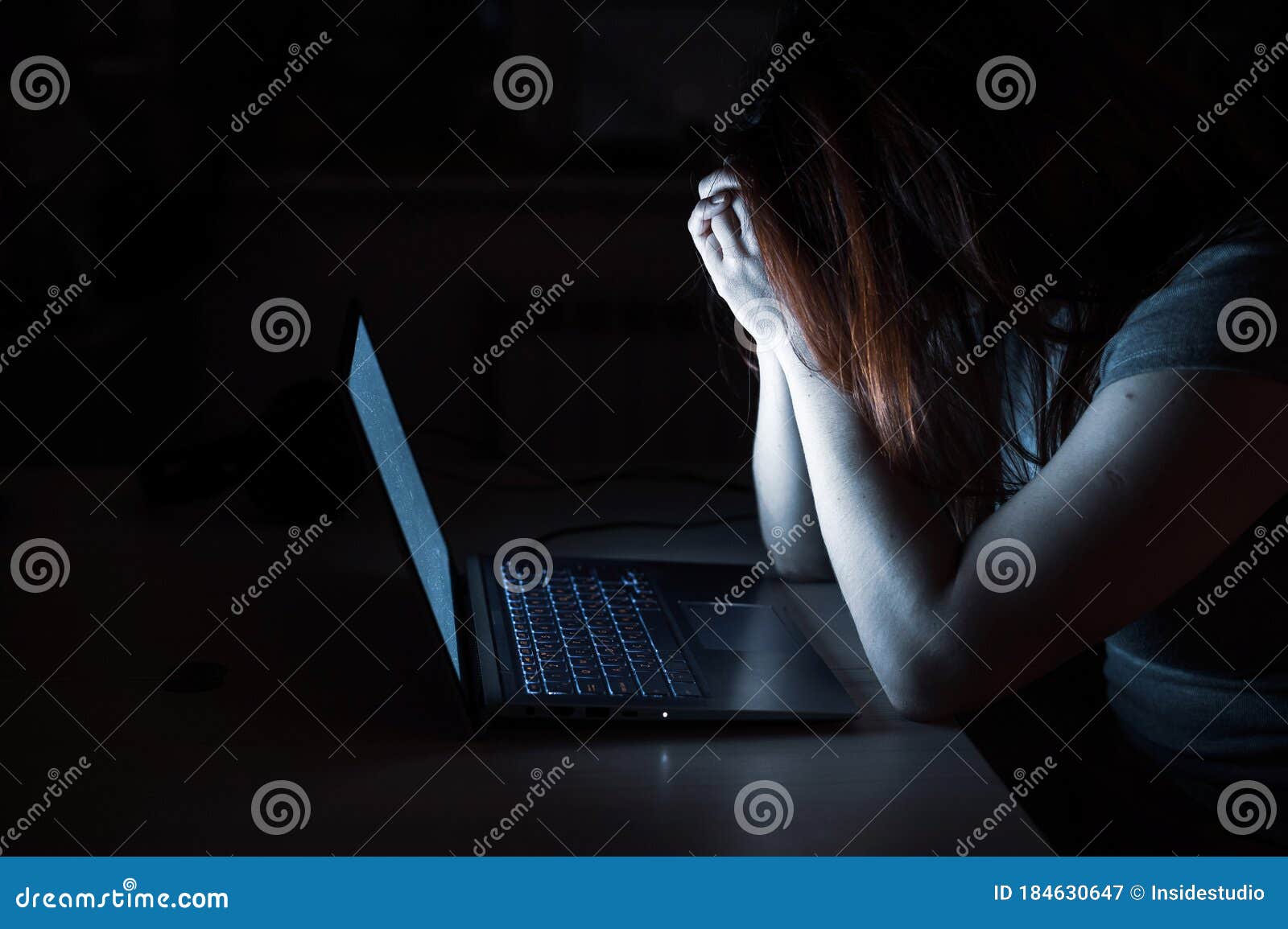 Tired Red Haired Woman Working On A Laptop The Girl At The Computer In