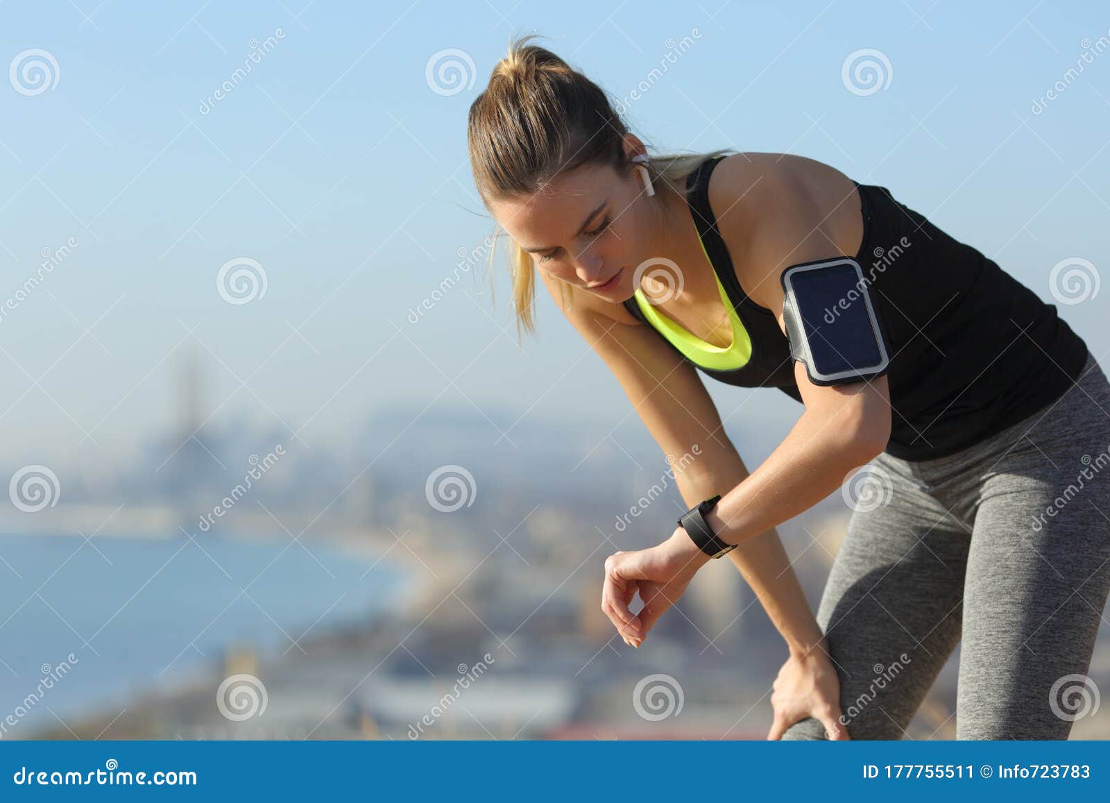 Tired Runner Checking Smartwatch after Exercise Stock Image - Image of ...