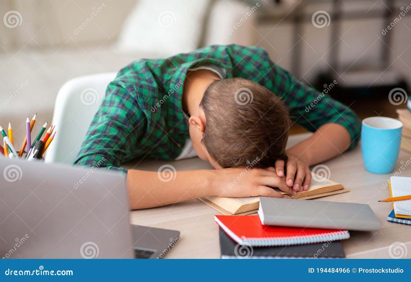 Tired School Boy Sleeping at Desk while Doing Homework Stock Photo ...