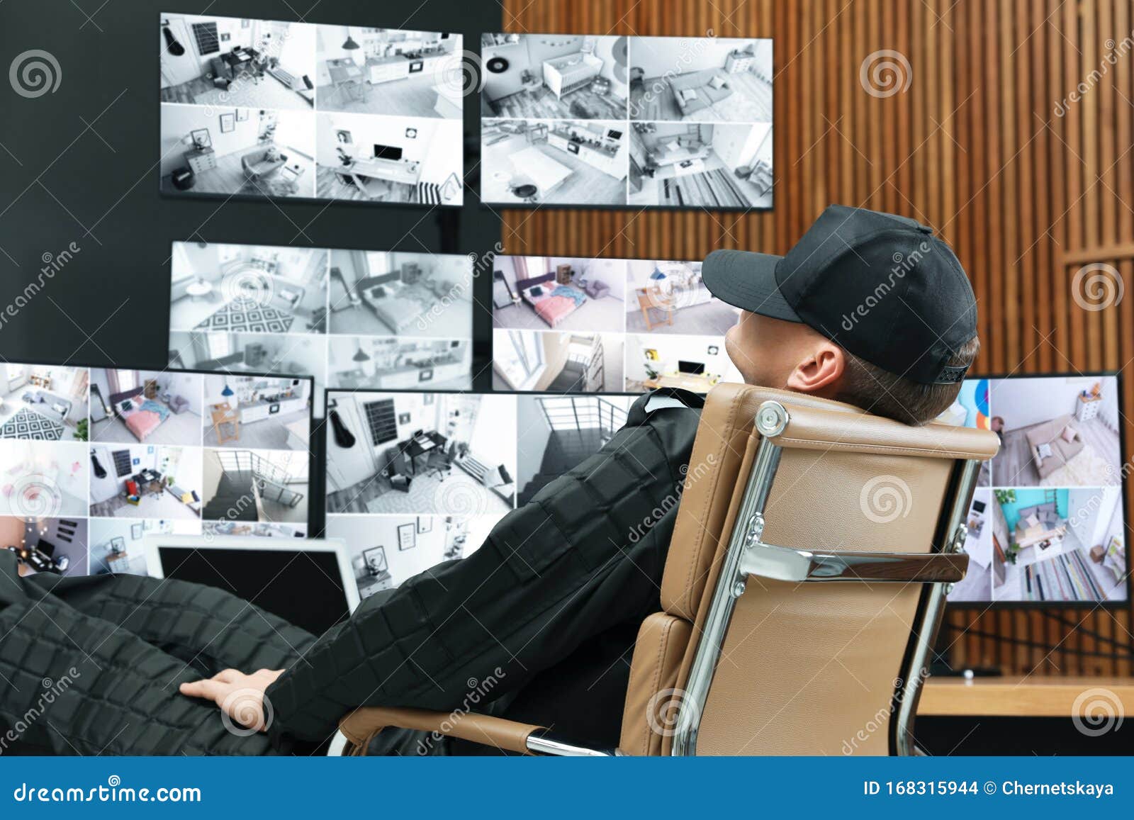 Tired Security Guard Sleeping at Workplace in Office Stock Photo ...