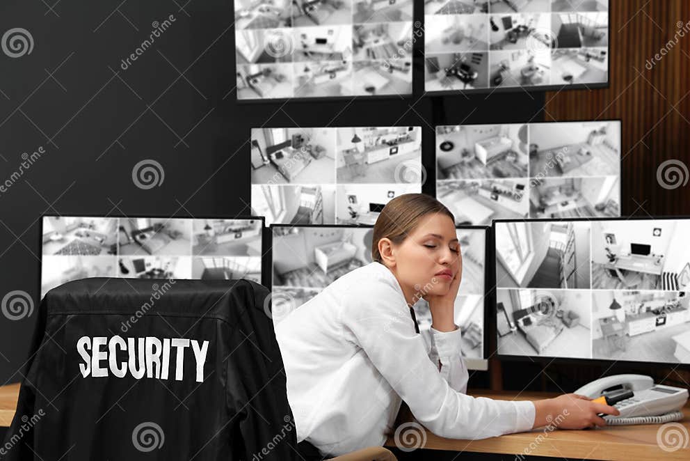 Tired Security Guard Sleeping at Workplace Stock Photo - Image of ...