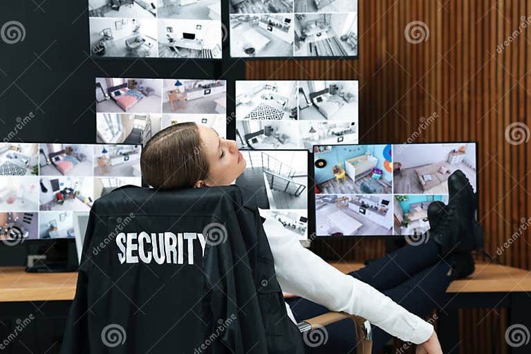 Tired Security Guard Sleeping at Workplace Stock Photo - Image of ...
