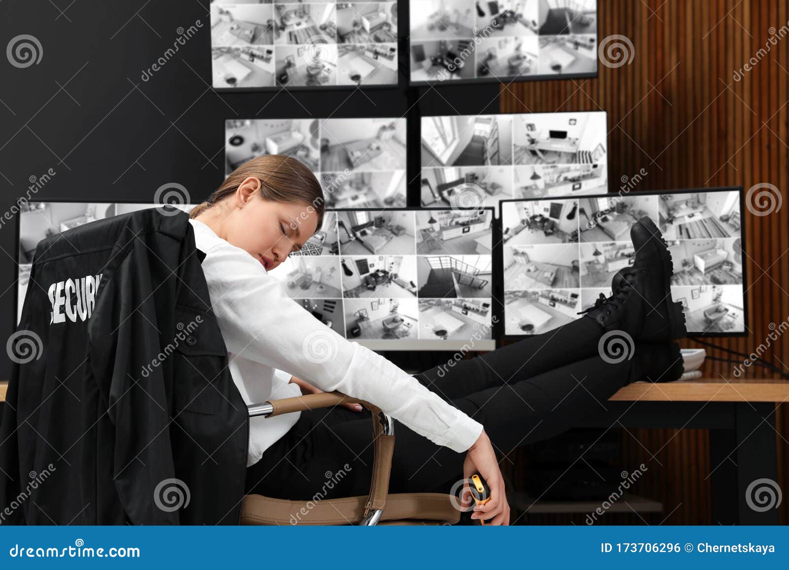 Tired Security Guard Sleeping at Workplace in Office Stock Photo ...