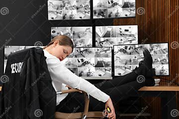 Tired Security Guard Sleeping at Workplace in Office Stock Photo ...