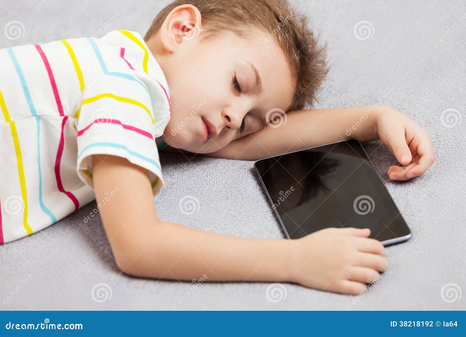 Tired Sleeping Child Boy Holding Tablet Computer Stock Photo - Image of ...