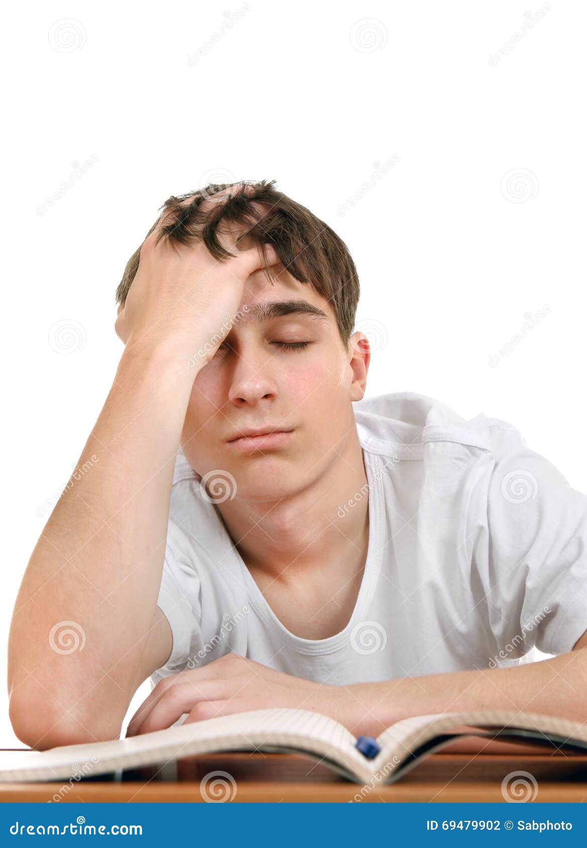 Tired Student with a Books stock photo. Image of college - 69479902