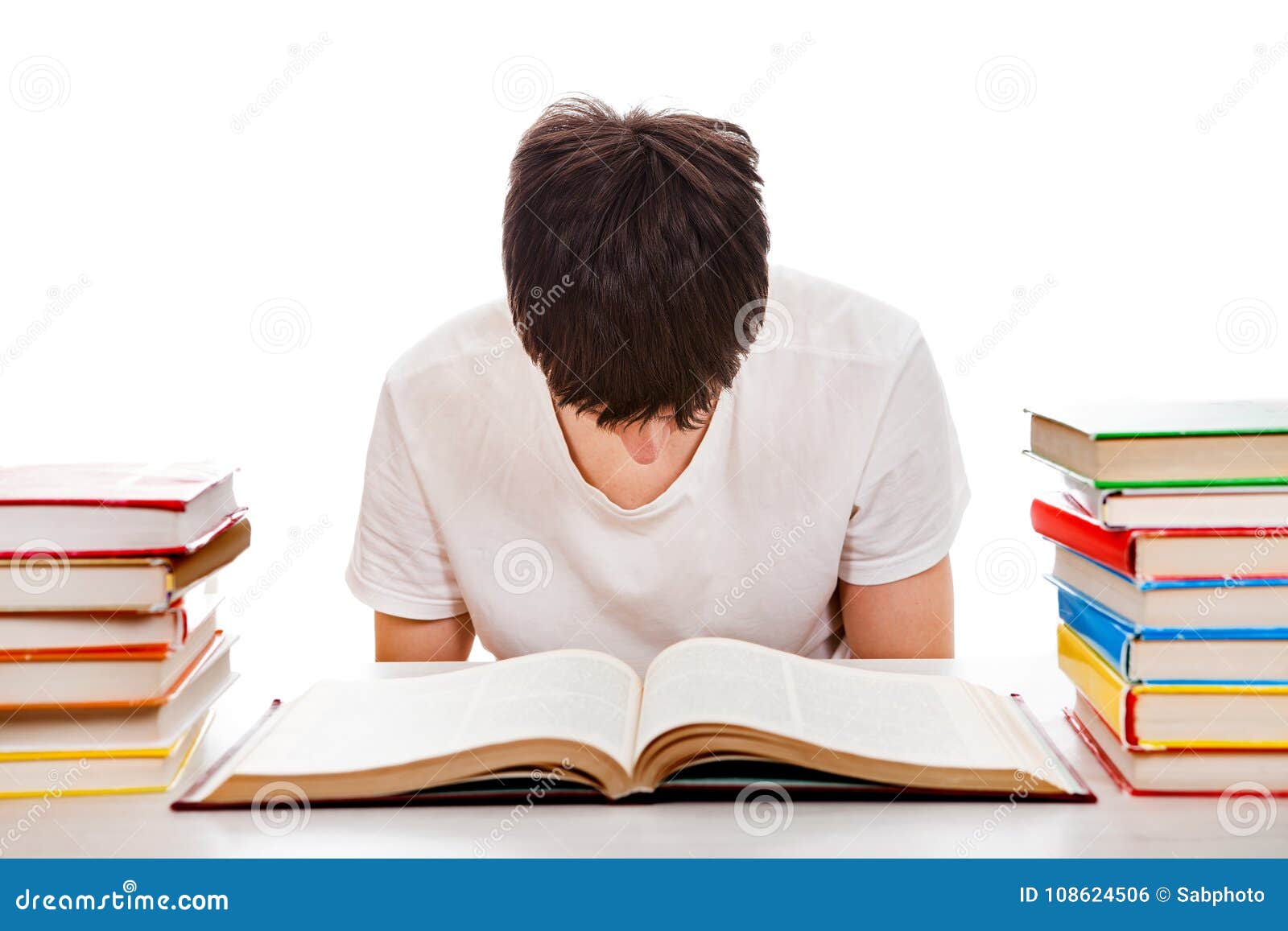 Tired Student with a Books stock photo. Image of homework - 108624506
