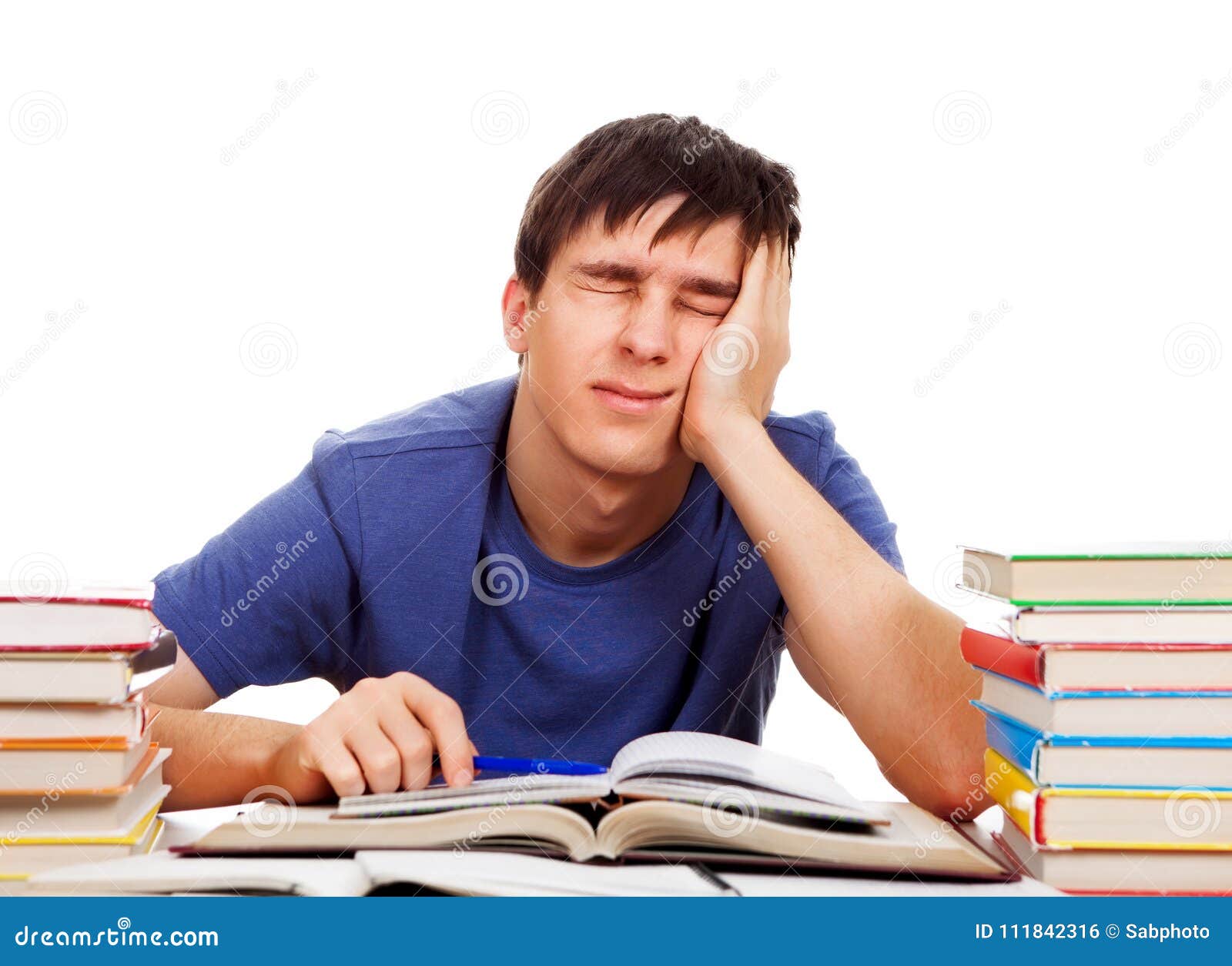 Tired Student with a Books stock photo. Image of exhausted - 111842316