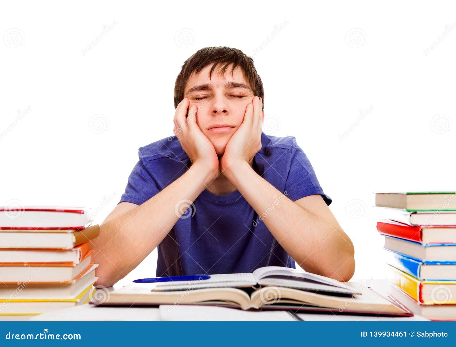 Tired Student with a Books stock image. Image of caucasian - 139934461