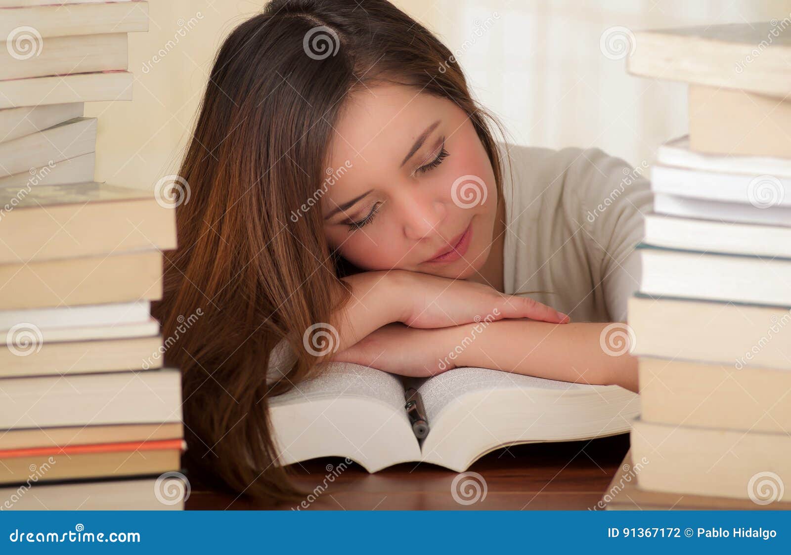 Tired Student Completely Sleep Over the Books in the Library Stock ...