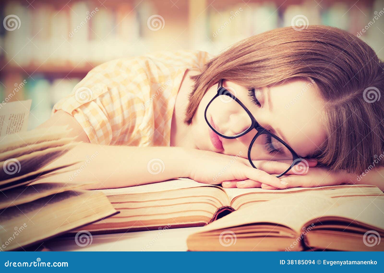 Tired Student Girl with Glasses Sleeping on Books in Library Stock ... Tired Student Girl with Glasses Sleeping on Books in Library Stock ...