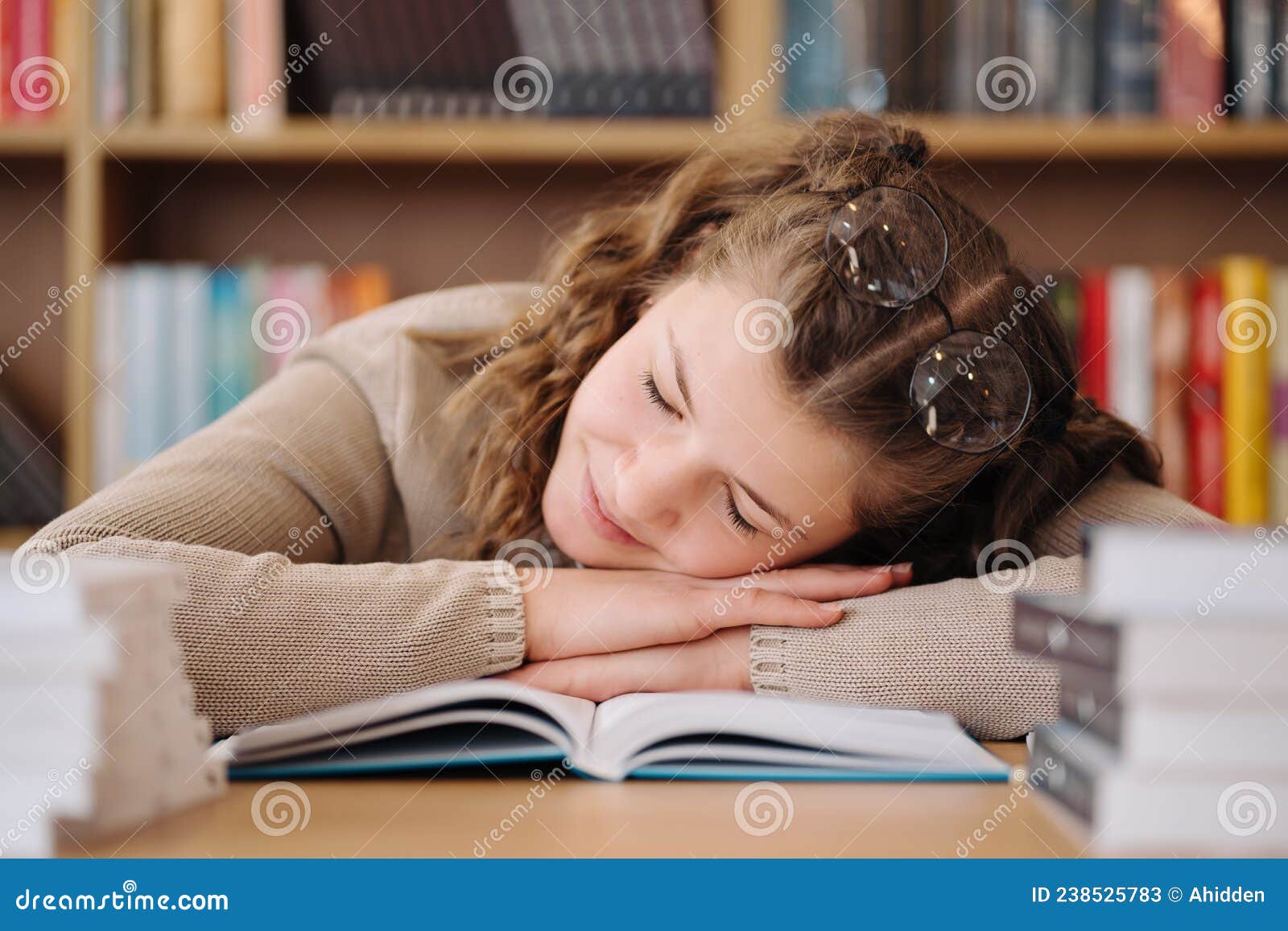 Tired Student Got Asleep on the Desk while Studying among Books Stock ... Tired Student Got Asleep on the Desk while Studying among Books Stock ...