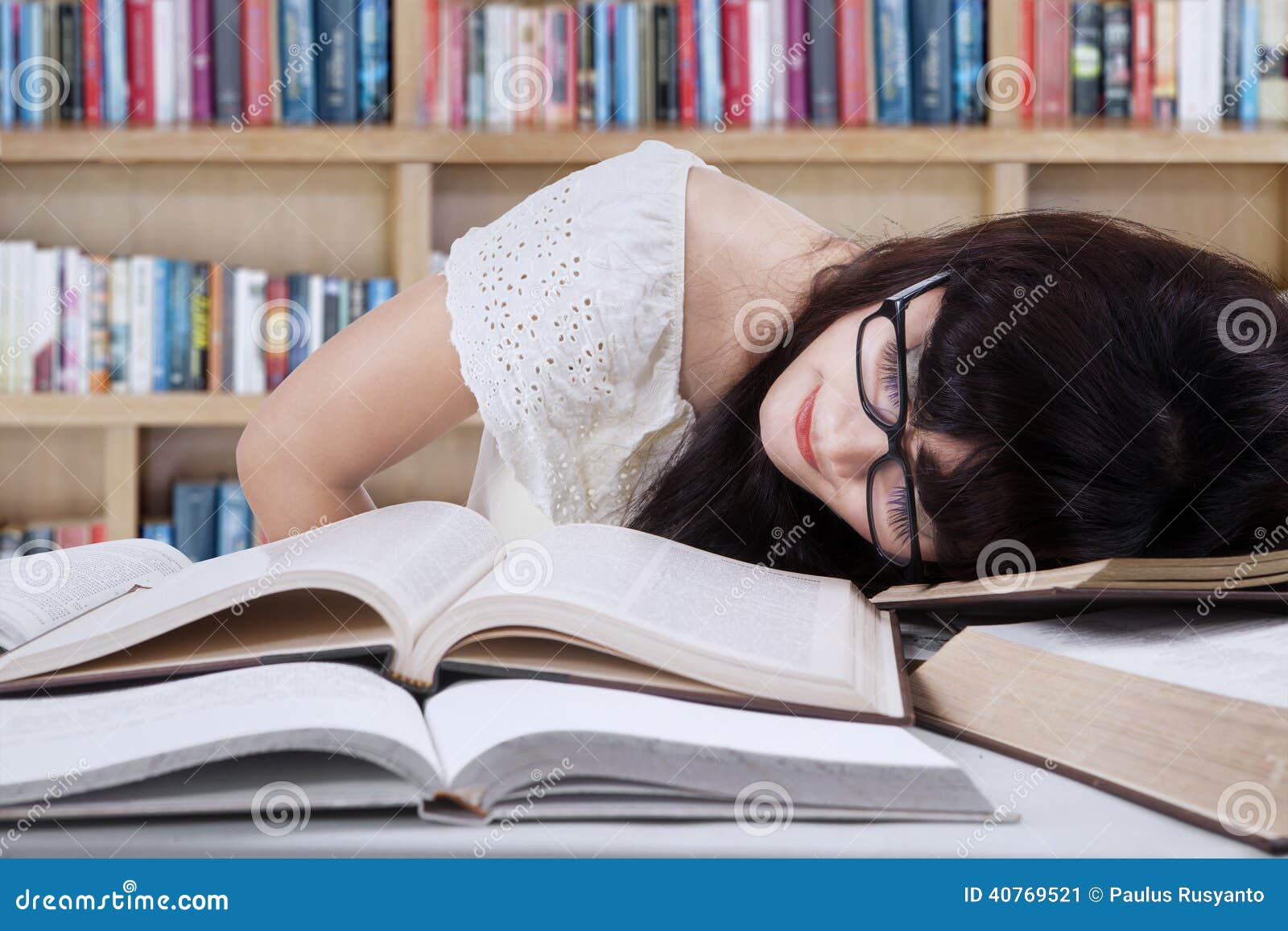 Tired student at library stock image. Image of academic - 40769521