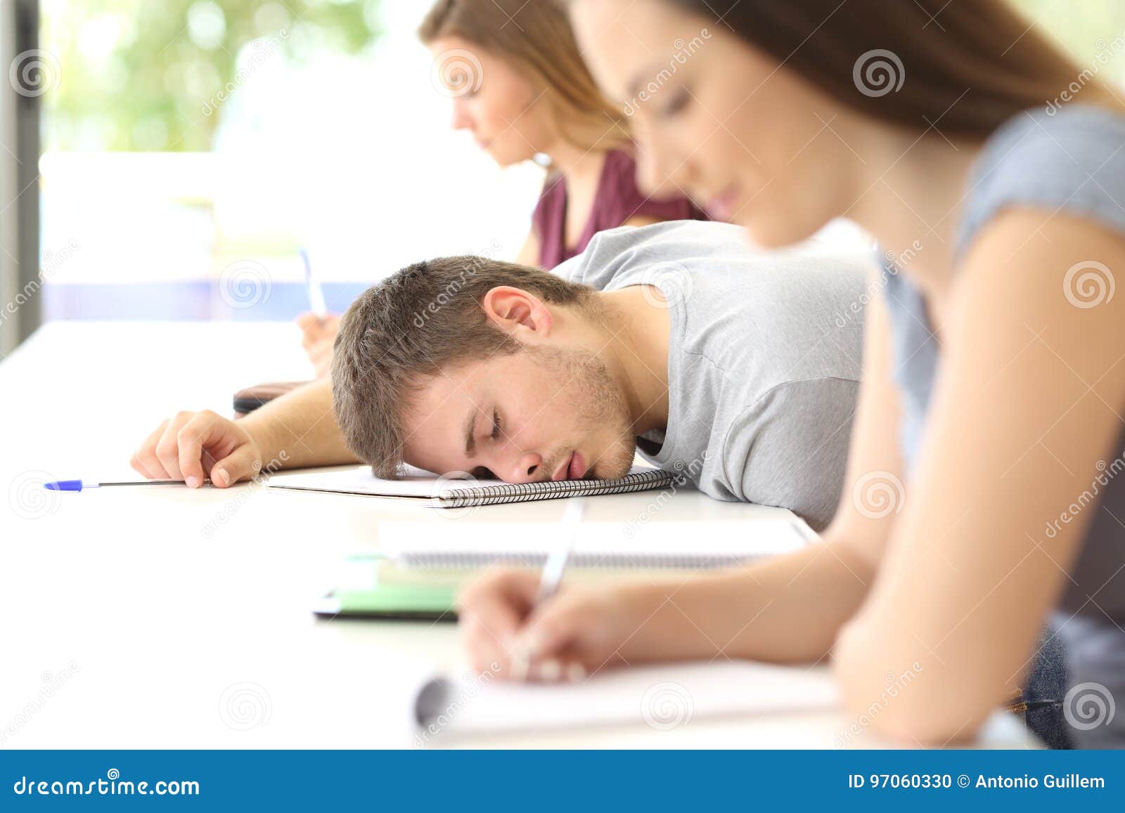 Tired Student Sleeping In A Class At Classroom Royalty-Free Stock Image ...