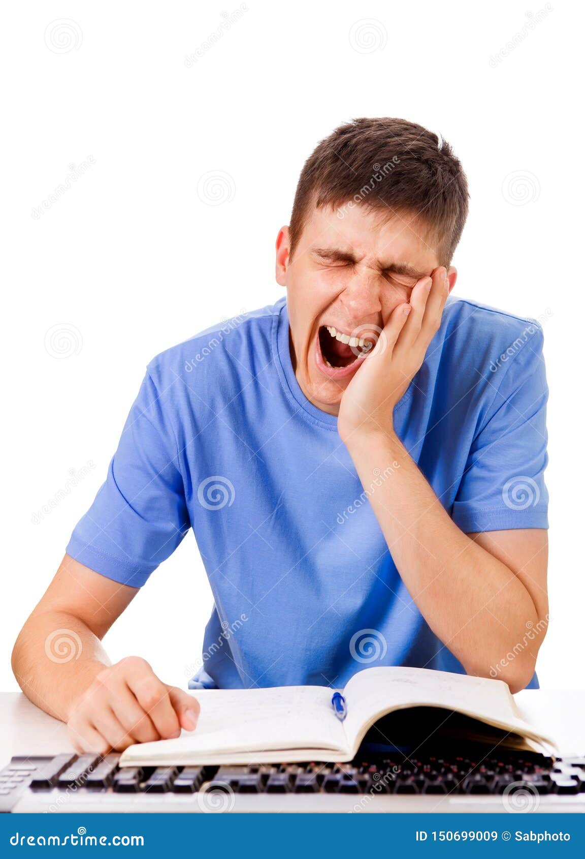 Tired Student yawning stock image. Image of caucasian - 150699009