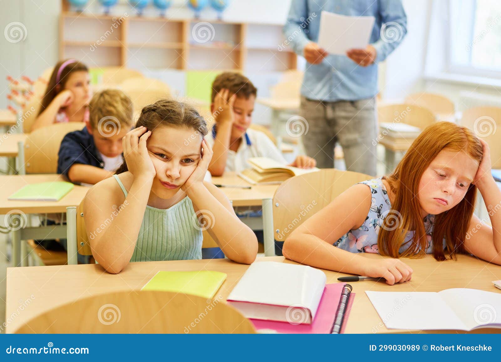 Tired Students Sitting on Bench in Classroom Stock Image - Image of ...