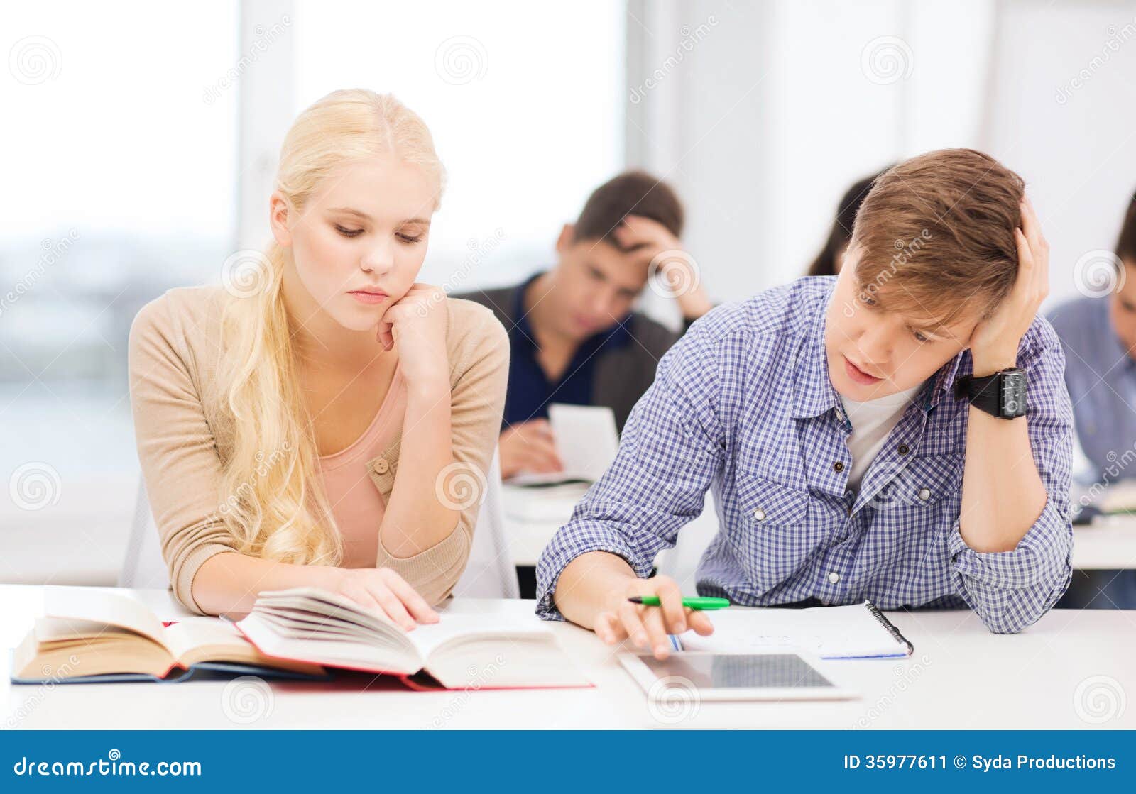 Tired Students Enjoy The Rest In The Yard Of The University Campus ...
