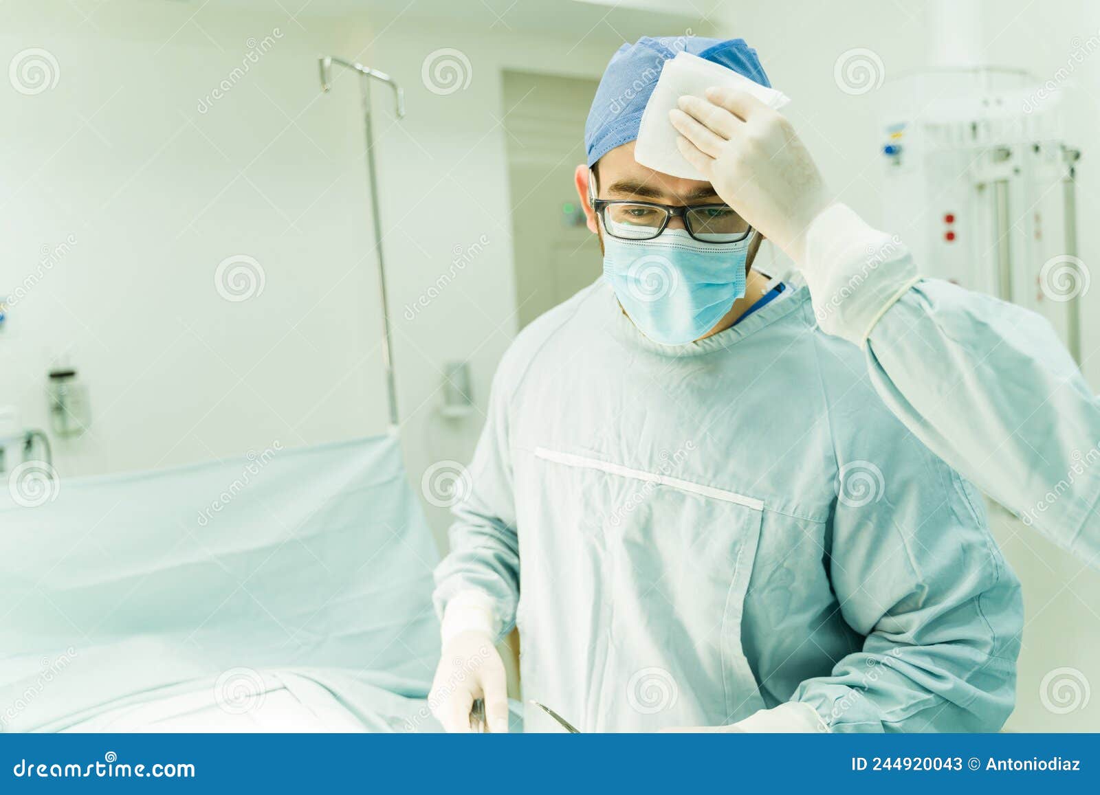 Tired Surgeon during a Long Surgery Stock Image - Image of scrubs ...