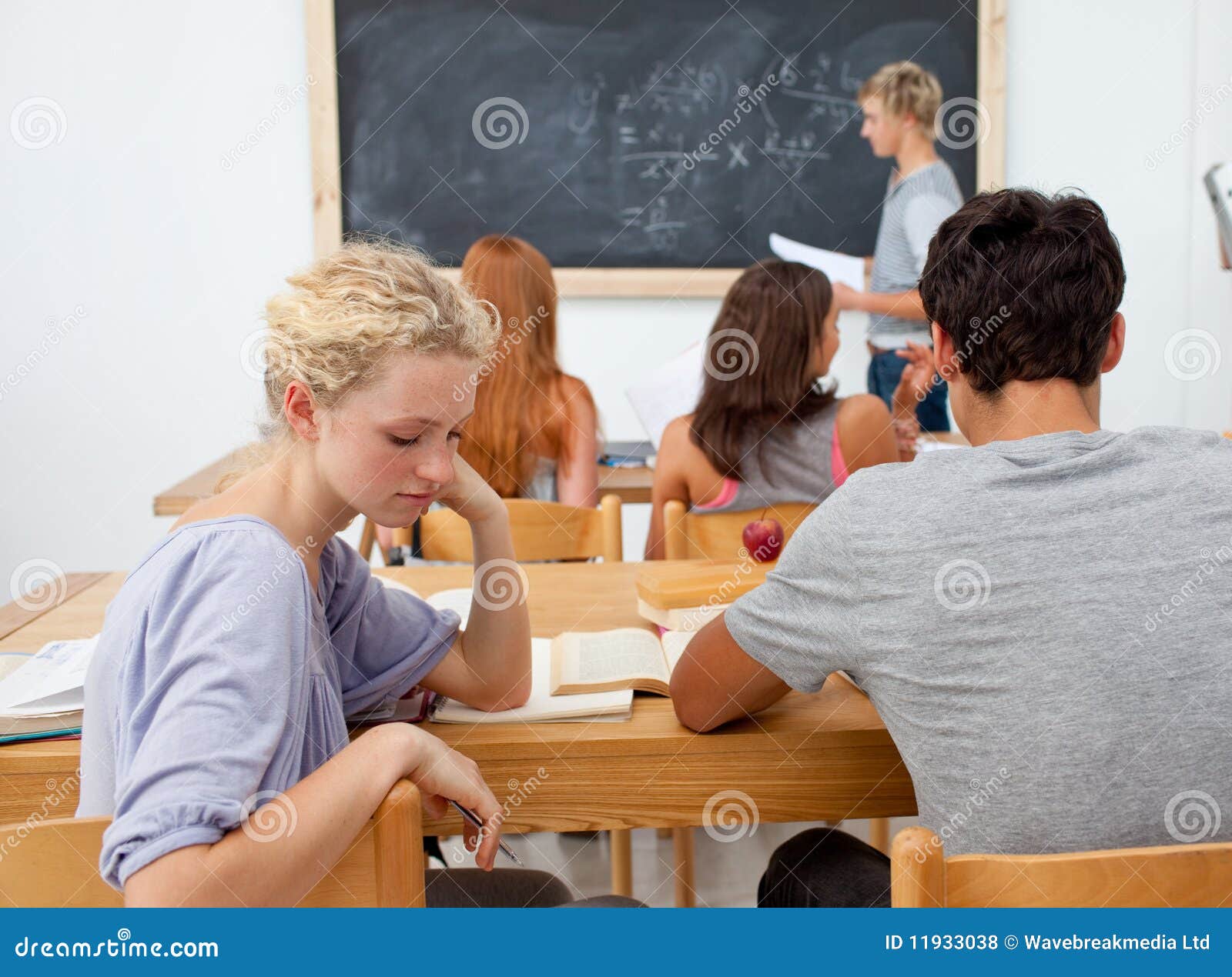 Tired Teenager Getting Bored in a Class Stock Photo - Image of indoor ...