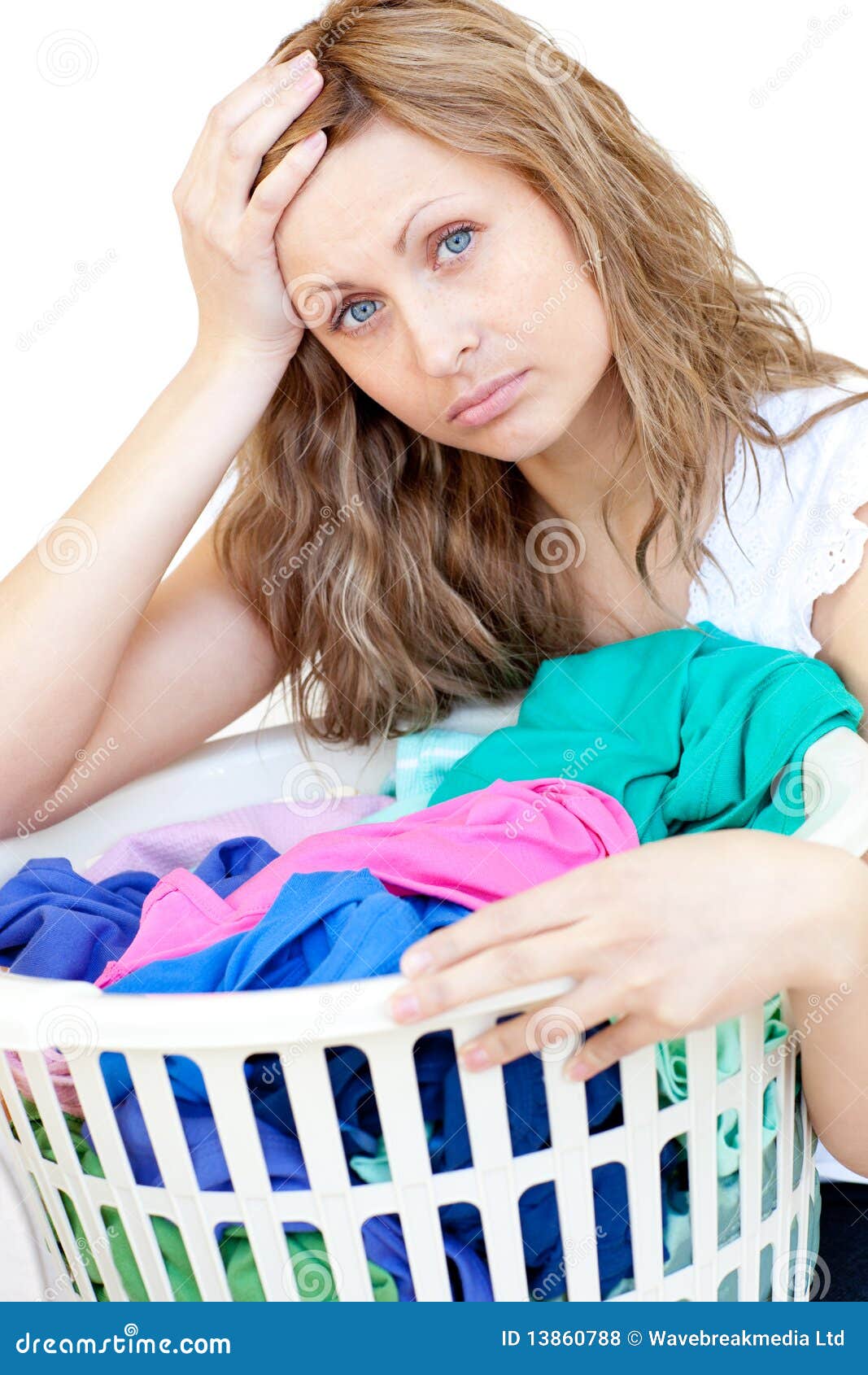 Tired woman doing laundry stock photo. Image of hold - 13860788