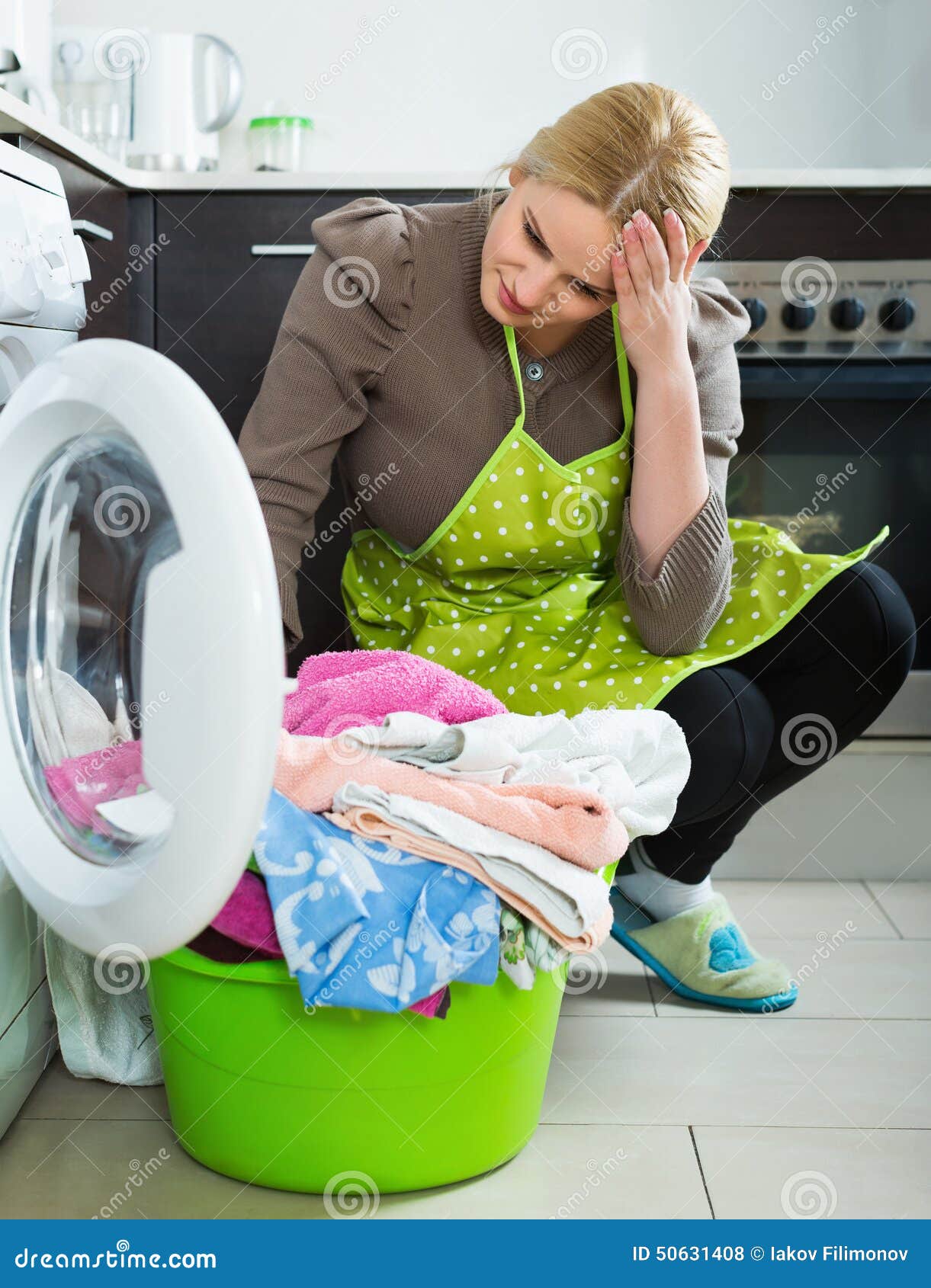 Tired woman doing laundry stock photo. Image of hygiene - 50631408