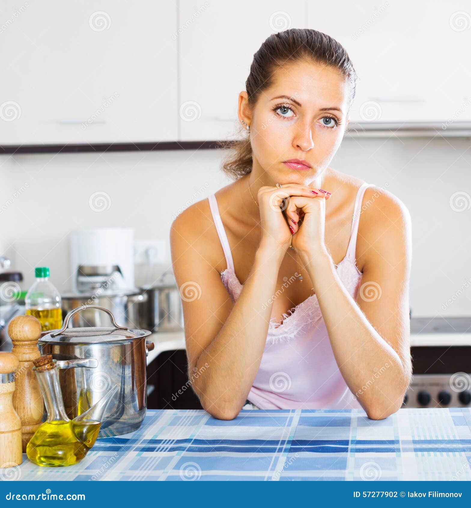 Tired woman at the kitchen stock photo. Image of casual - 57277902